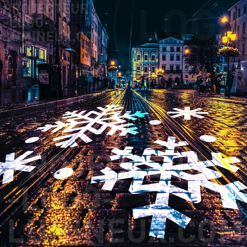 Snowflake projector for illuminated decoration on the floor or façade